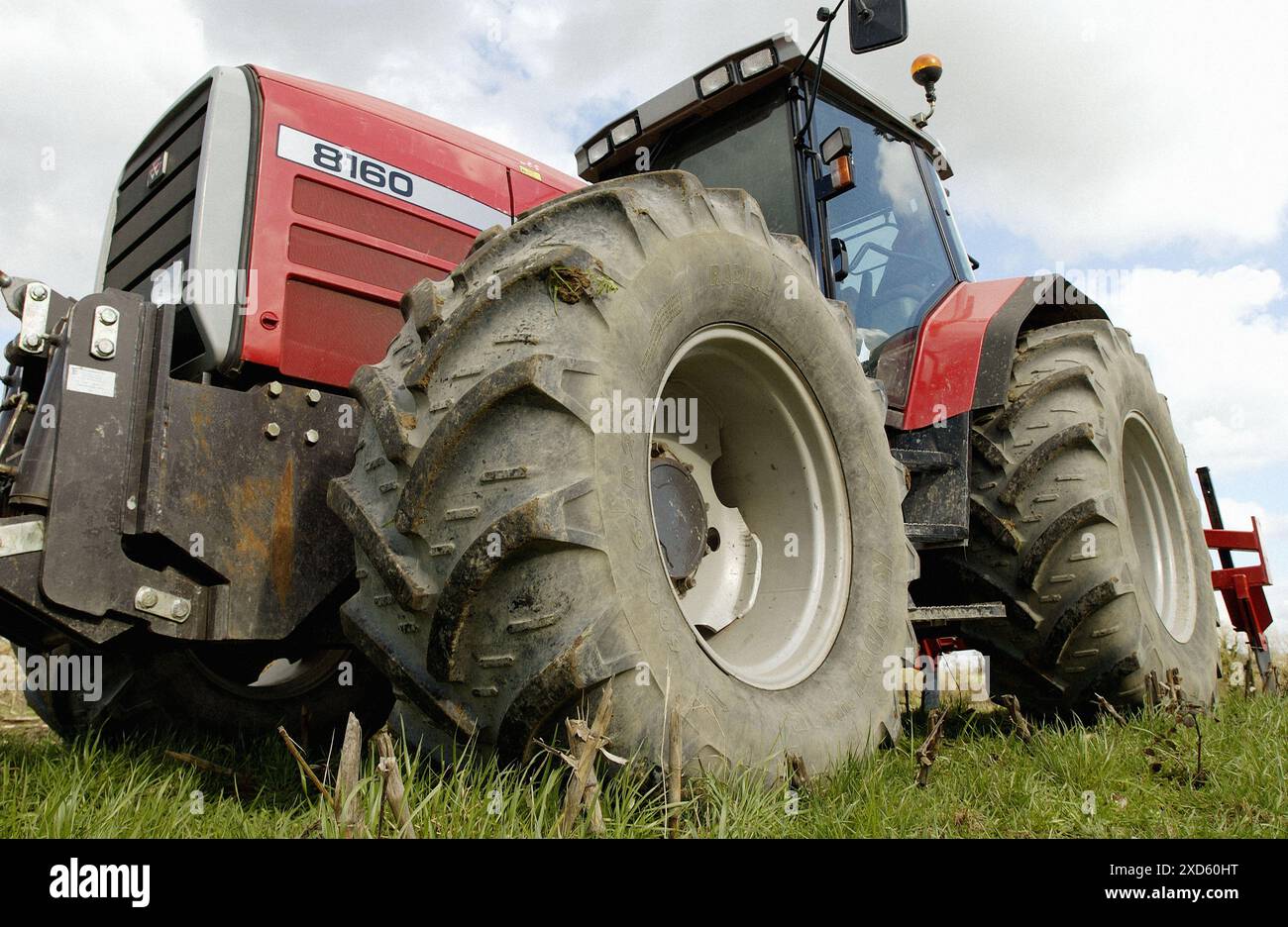 Tractor at field Stock Photo - Alamy