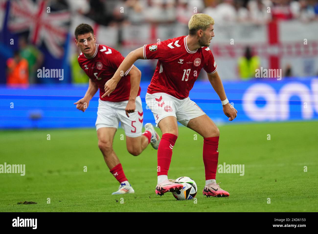 Jonas Wind and Joakim Maehle of Denmark during the UEFA Euro 2024 match ...