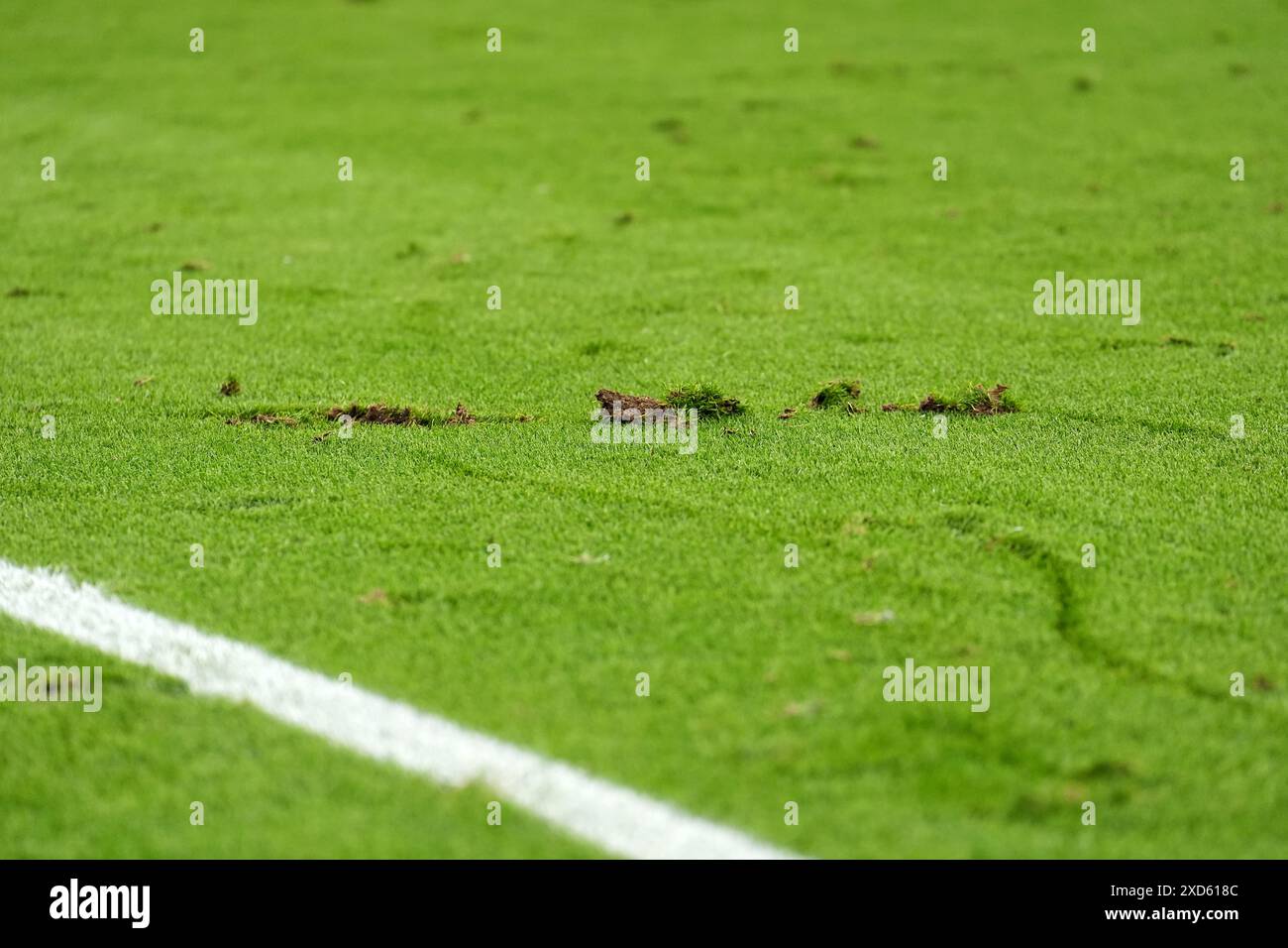 Divots on the pitch during the UEFA Euro 2024 match at the Frankfurt ...