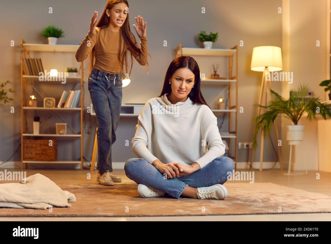 Angry, disappointed teenage daughter is crying and having argument with ...