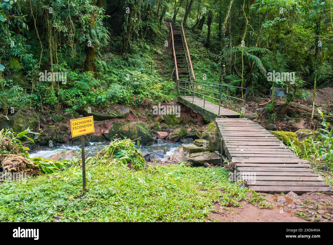 Wooden bridge and staircase that leads to Cachoeira escondida, a ...