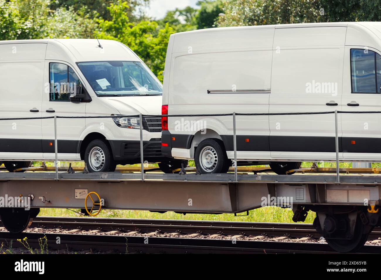 Many new modern electric and fuel cars vans transportation by cargo ...