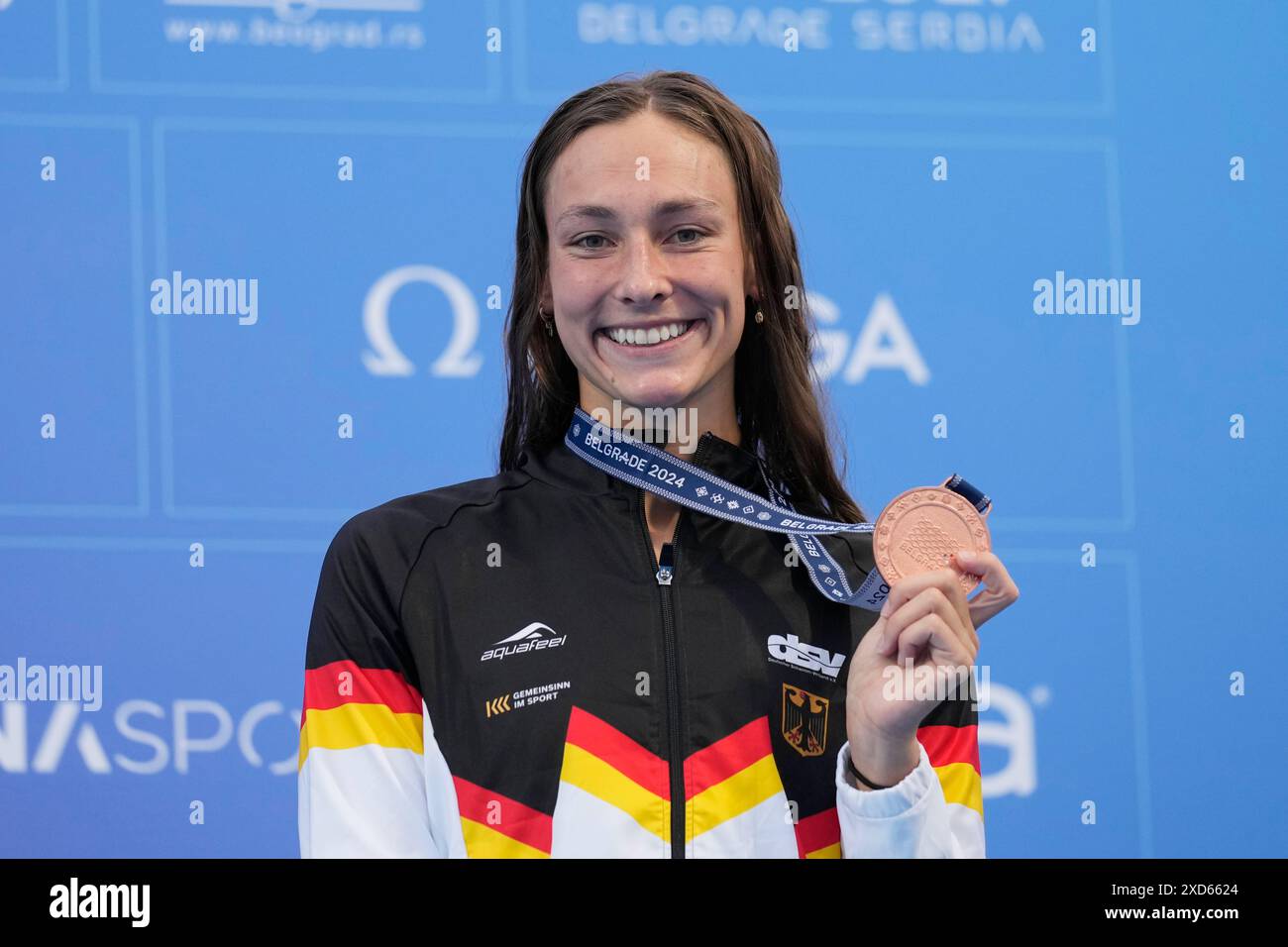 Third placed Nicole Maier of Germany poses during the medal ceremony ...