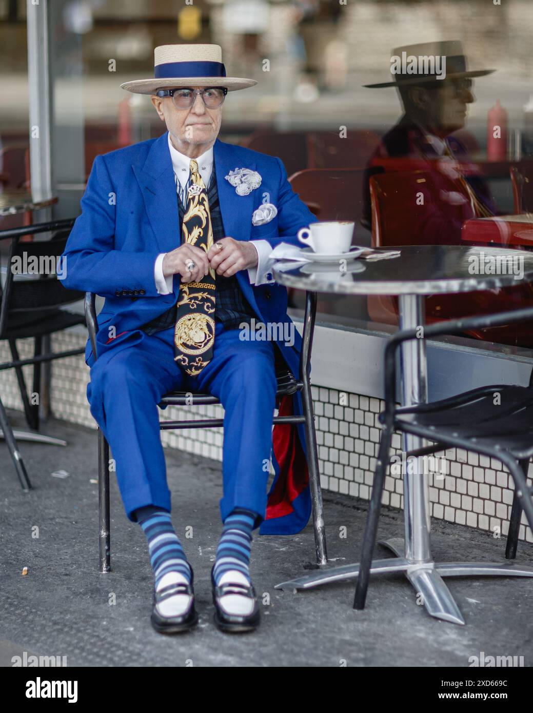 George Skeggs, famously known as Soho George takes tea outside a cafe ...