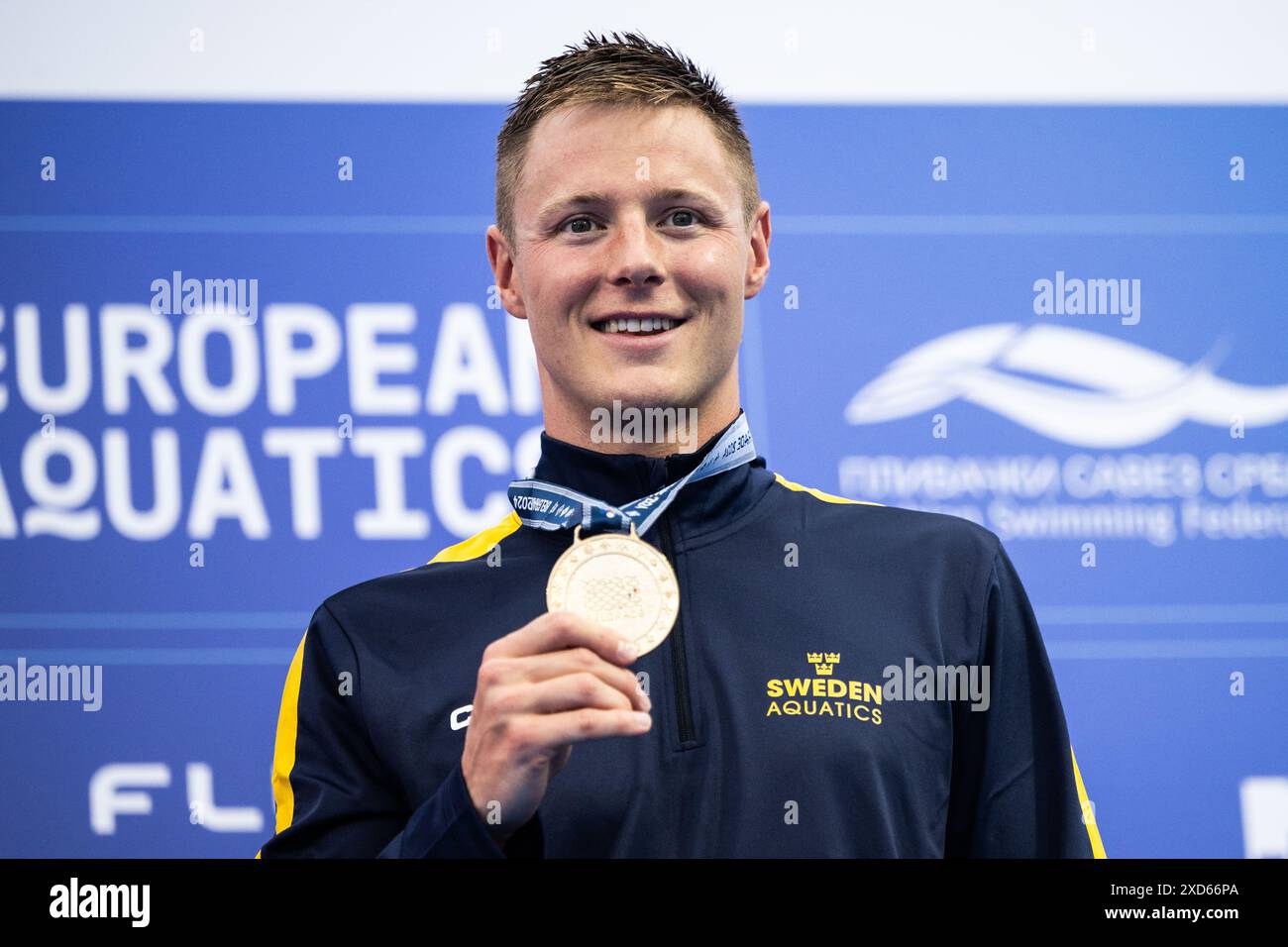 Erik Persson of, Sweden. , . at the medal ceremony after men's 200 meter breaststroke final ...