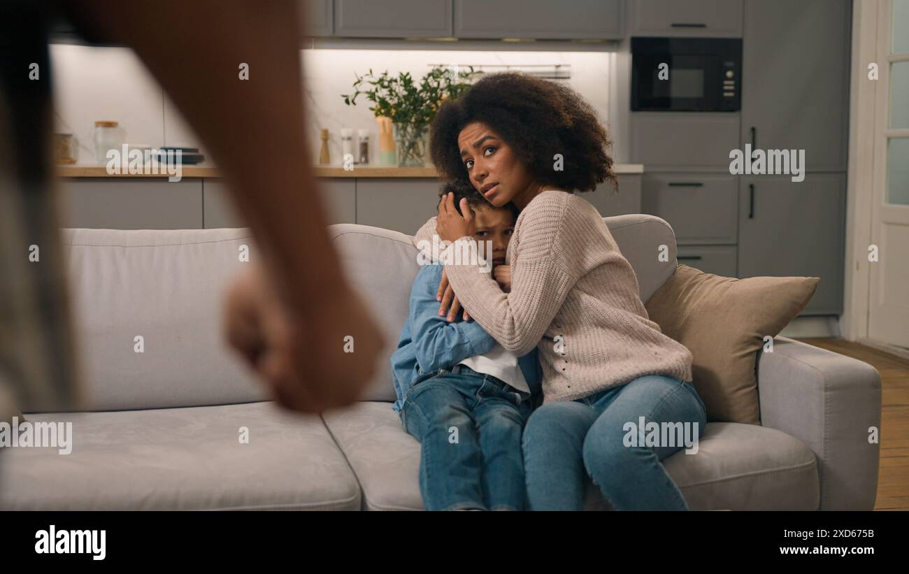 Domestic violence African American ethnic family. Aggressive man father ...