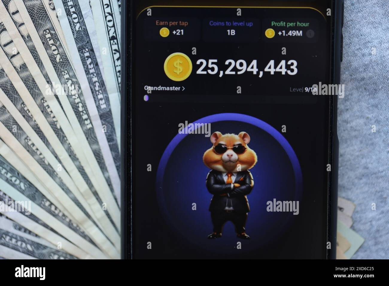 KYIV, UKRAINE - JUNE 20, 2024 Hamster Kombat tap 2 earn mini game in ...