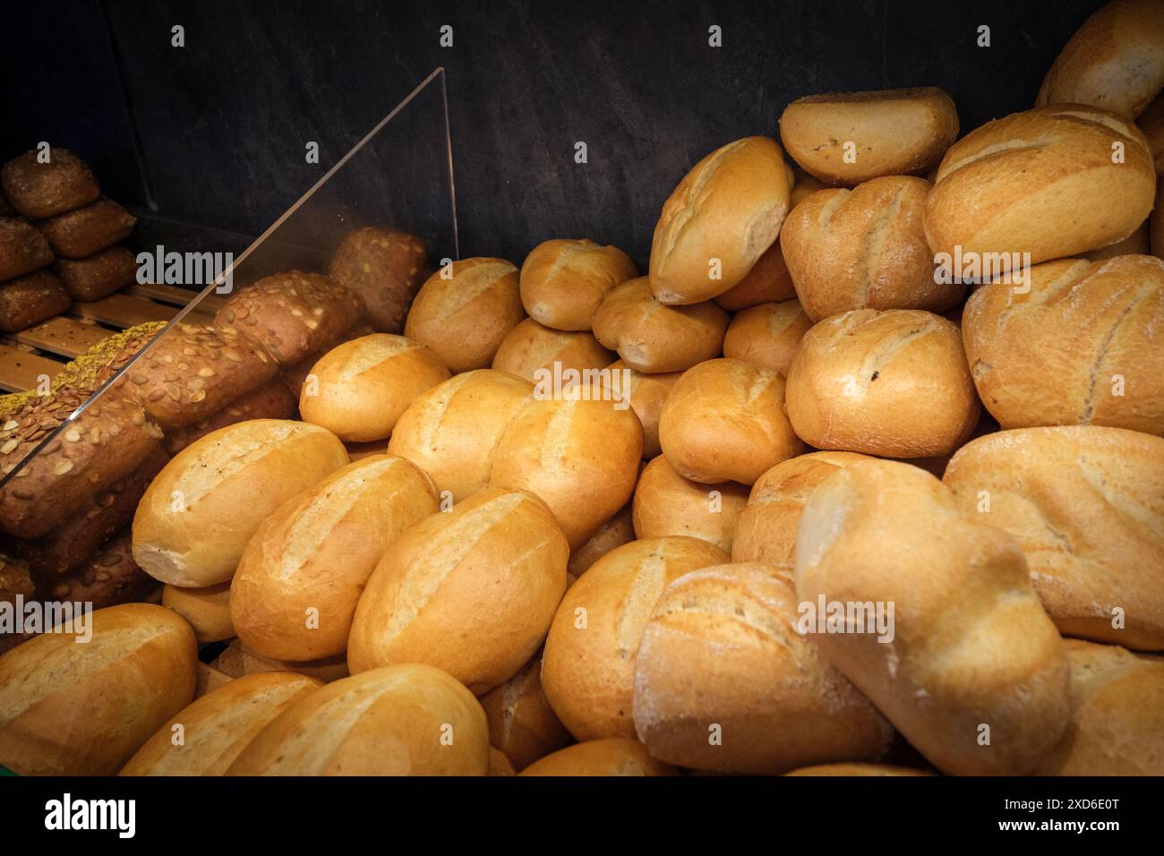 freshly baked bread rolls lie in the display of a bakery Stock Photo ...