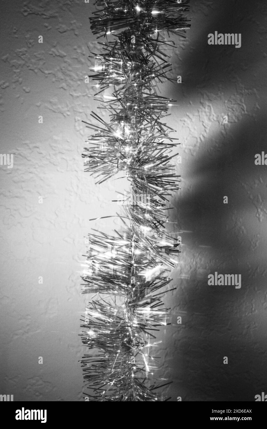 Silver tinsel against white hi-res stock photography and images - Alamy
