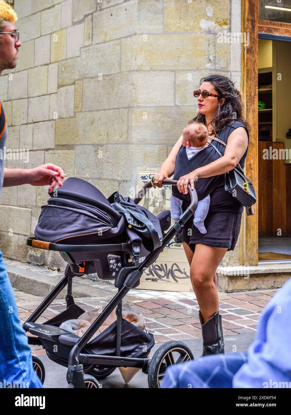 Young mother pushing baby hi-res stock photography and images - Alamy
