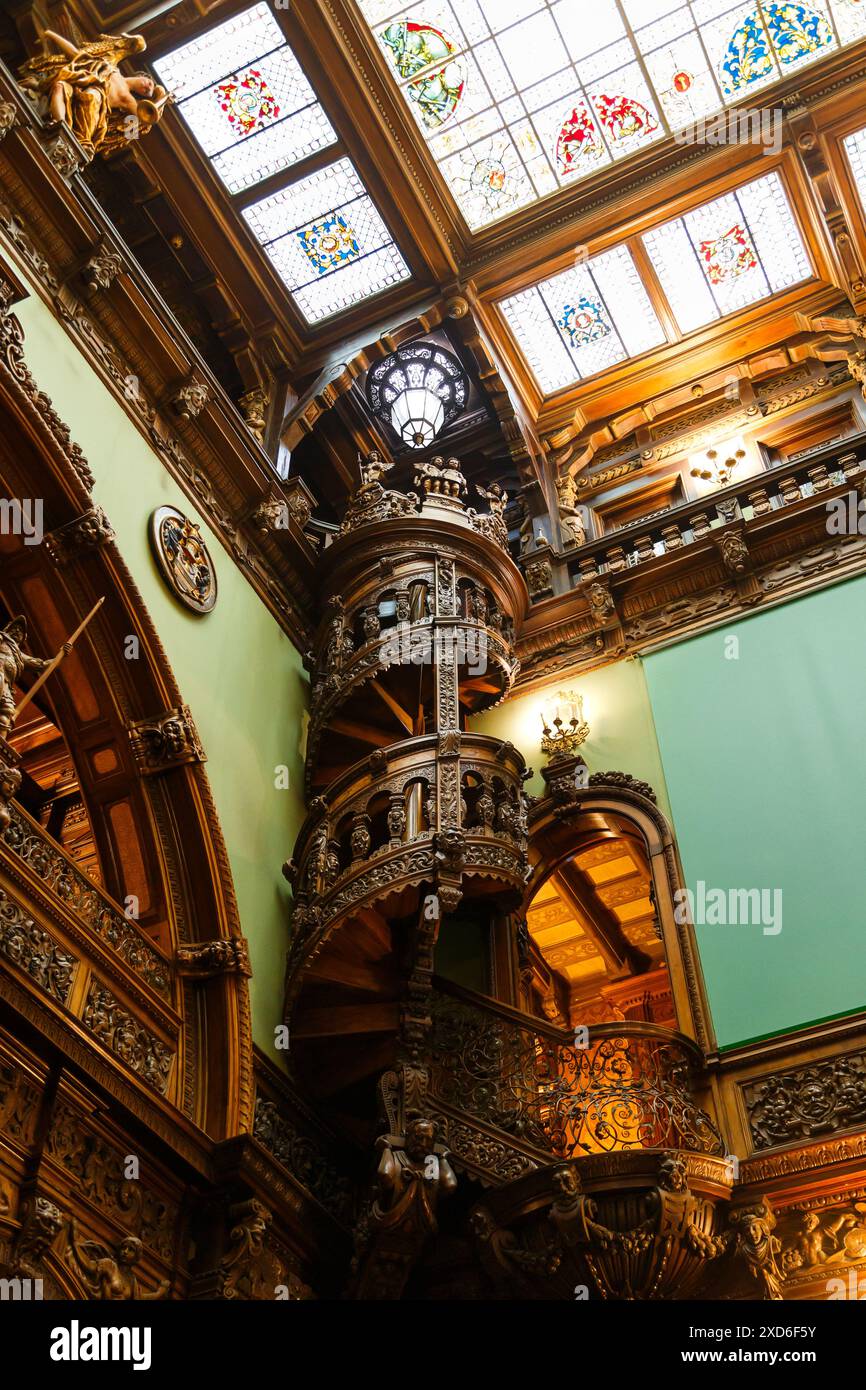 Sinaia, Romania - August 26, 2022: Wood-carved spiral staircase in the ...