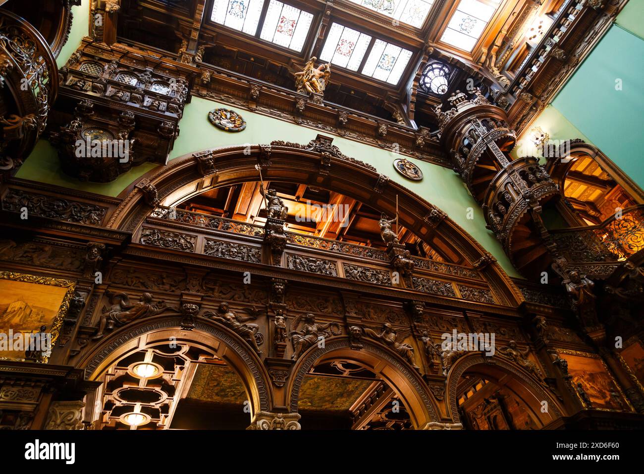 Sinaia, Romania - August 26, 2022: Wood-carved spiral staircase and ...
