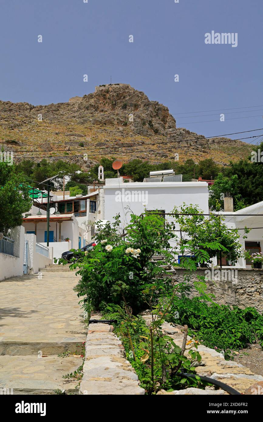 Street scene, Megalo Chorio village and mountain top castle, Tilos ...