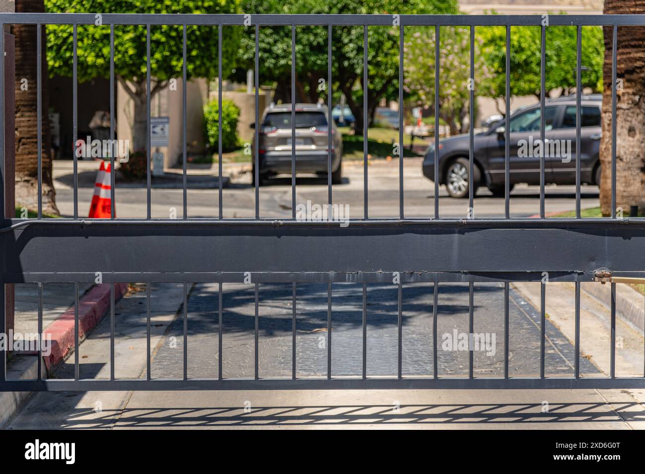 Gate at entrance to gated residential community Stock Photo - Alamy