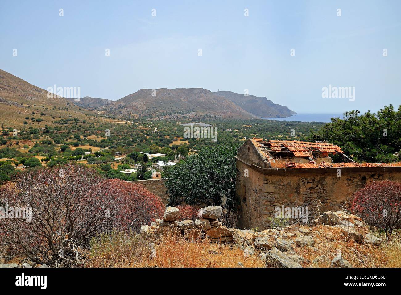 Landscape with view across Eristos Valley and ruined buildings, Megalo ...