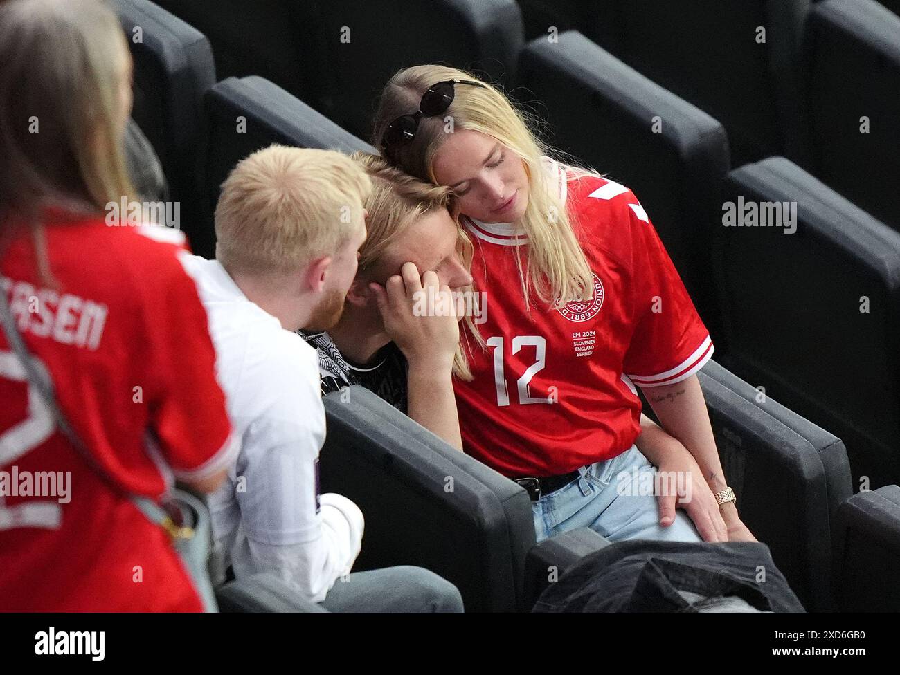 Denmark's Kasper Dolberg and partner Laerke Julie Tranberg after the ...