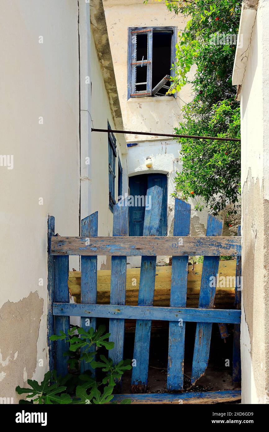 Dilapidated traditional village house and courtyard, Megalo Chorio ...