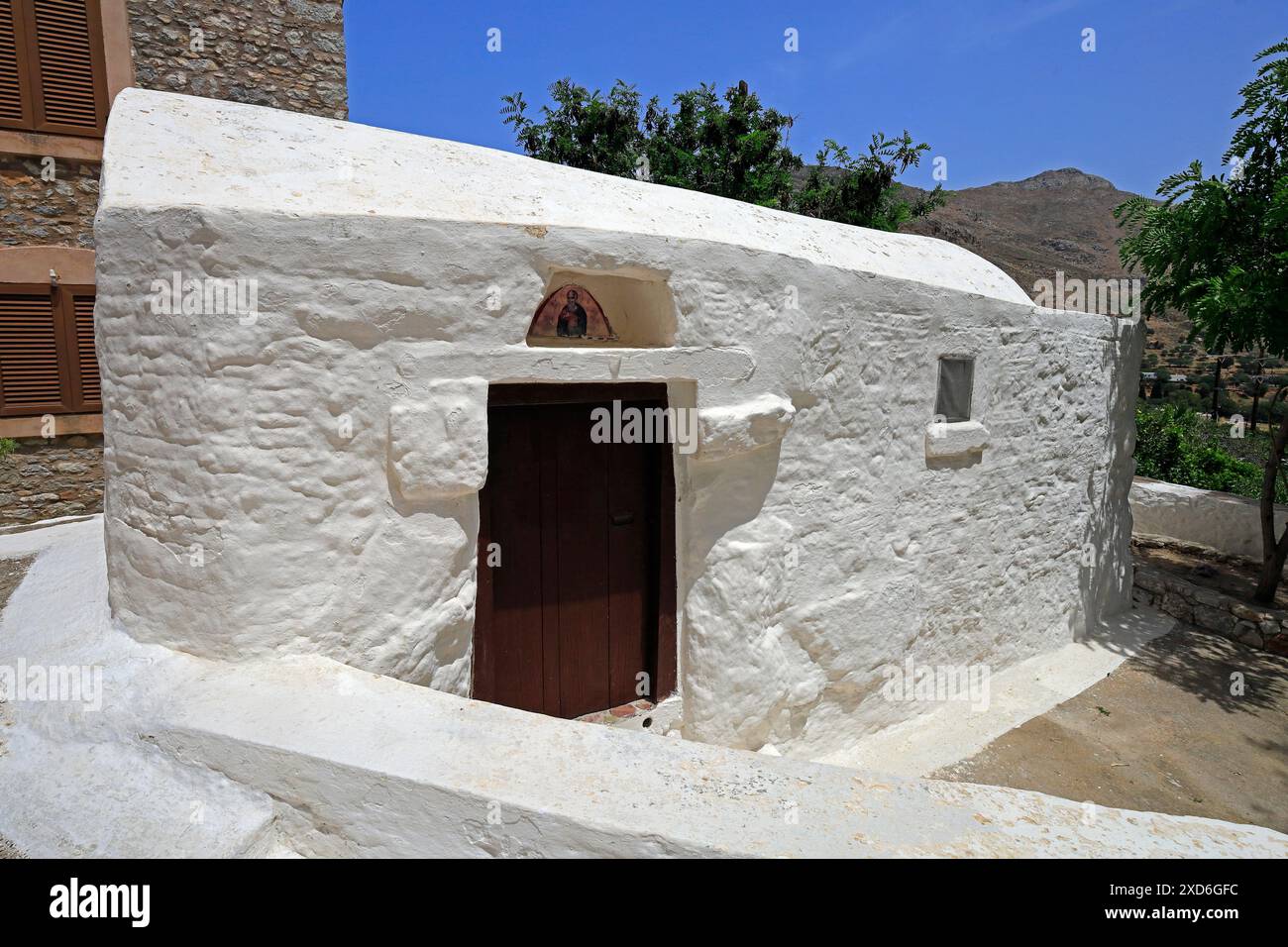 Street scene - small pretty whitewashed Greek church, Megalo Chorio ...