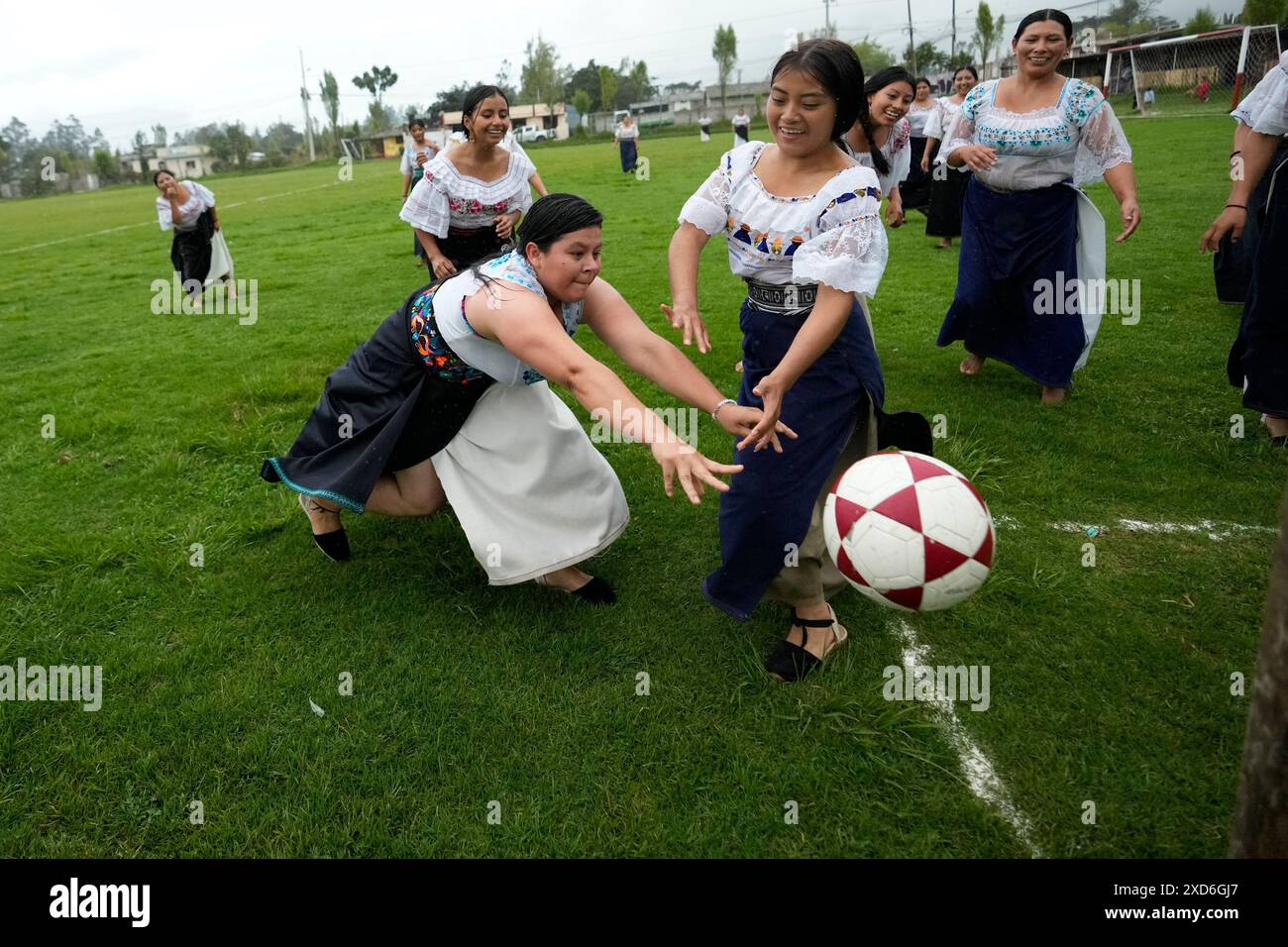 Indigenous women fight for the ball during a "handball with anaco ...