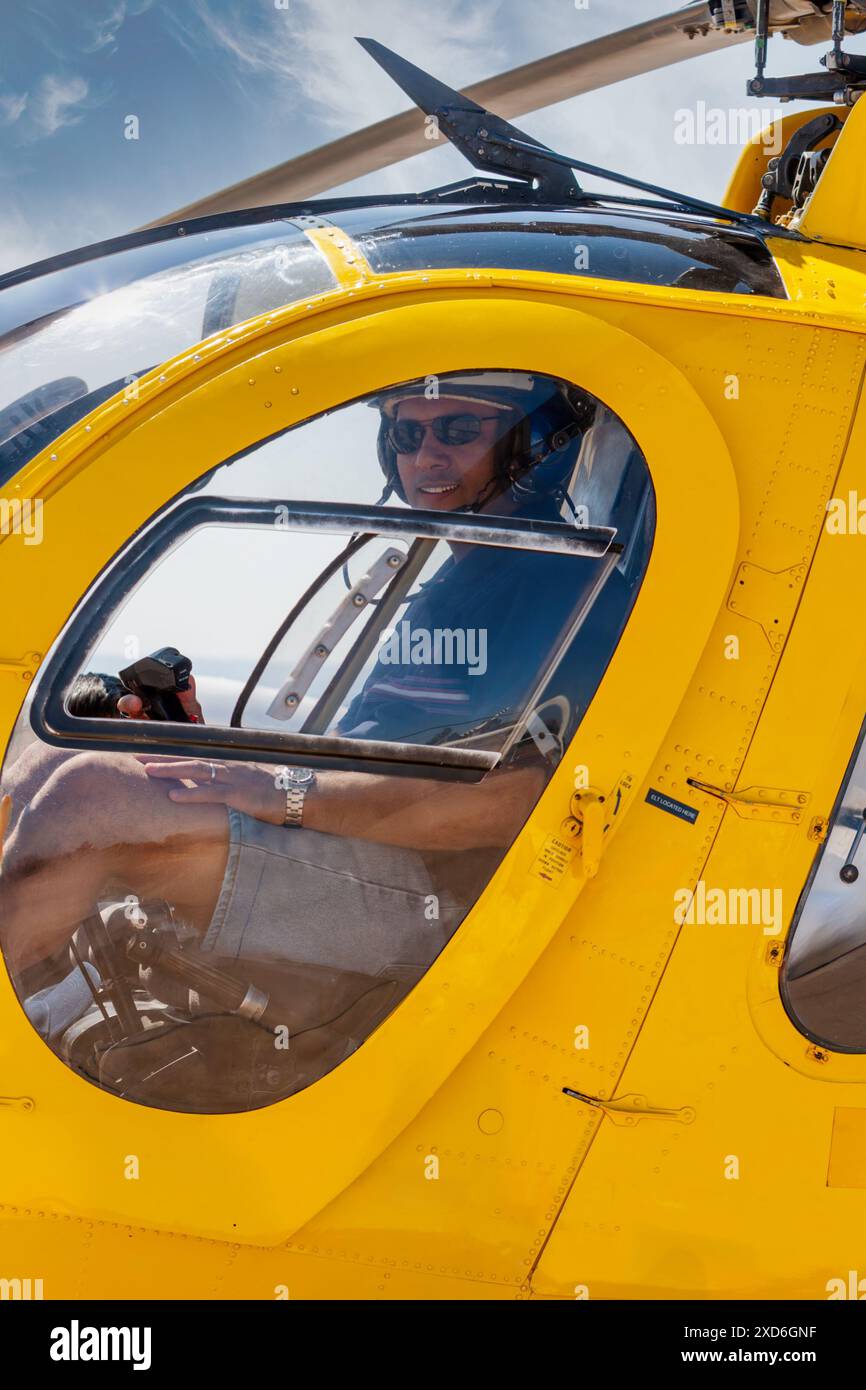 helicopter Arab pilot, flying a rescue chopper, wearing helmet and ...