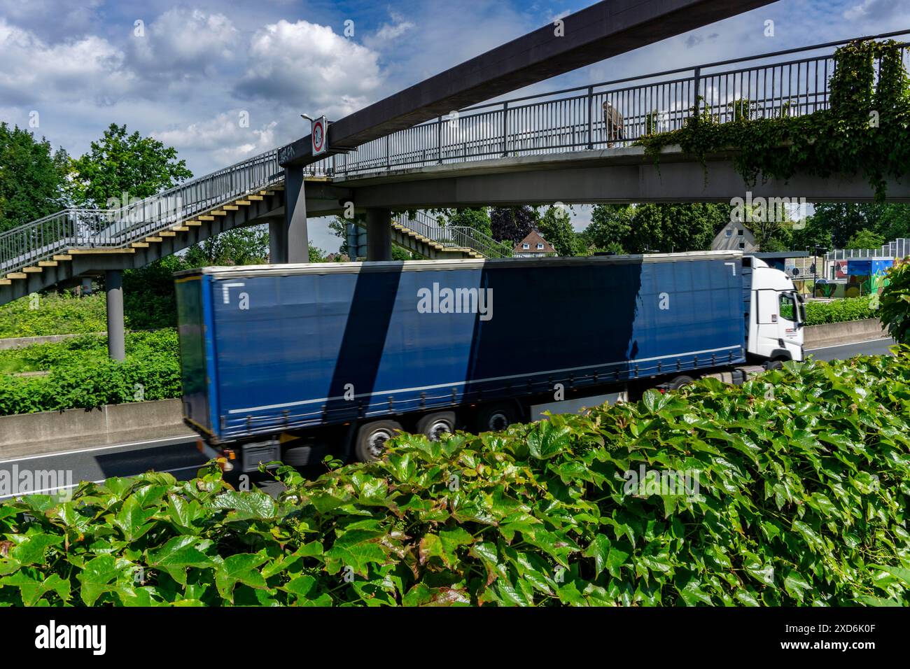 Pedestrian bridge over the A40 highway, Ruhrschnellweg, at the Essen ...