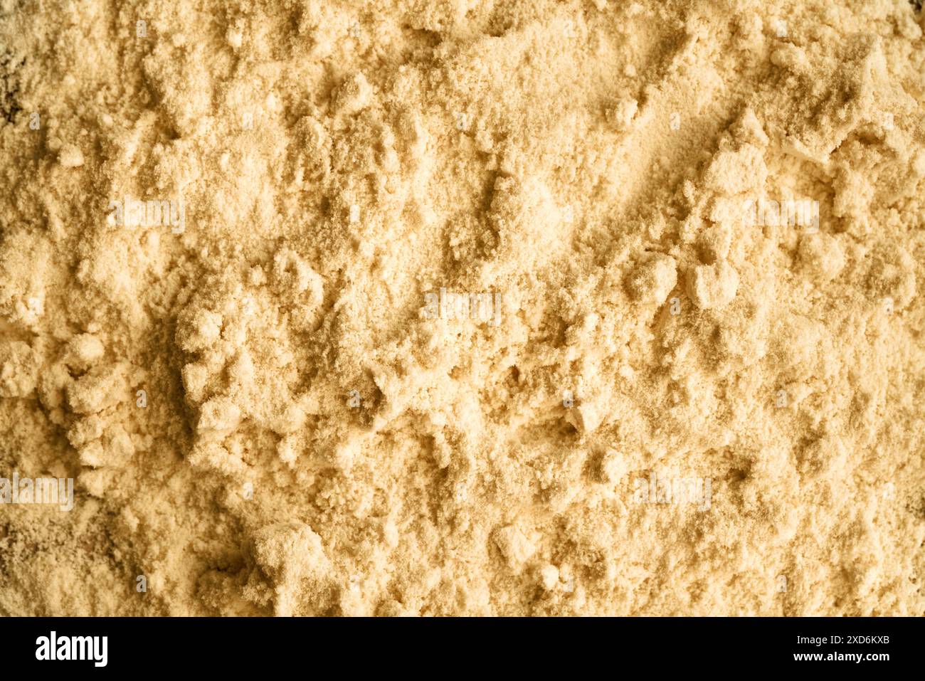 Textured background made of whey protein powder Stock Photo - Alamy