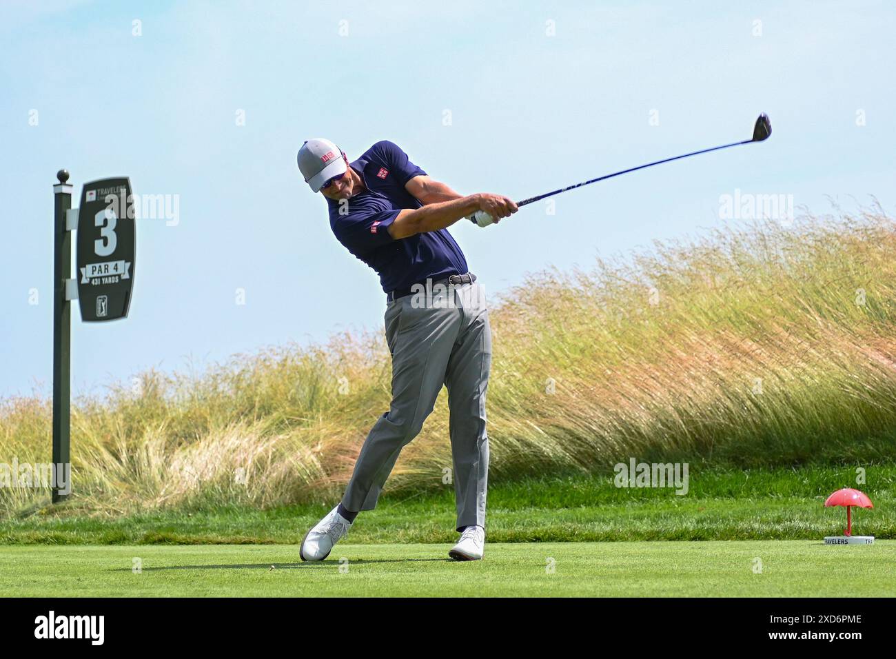 Thursday June 20, 2024: Adam Scott watches tees off on the third hole ...