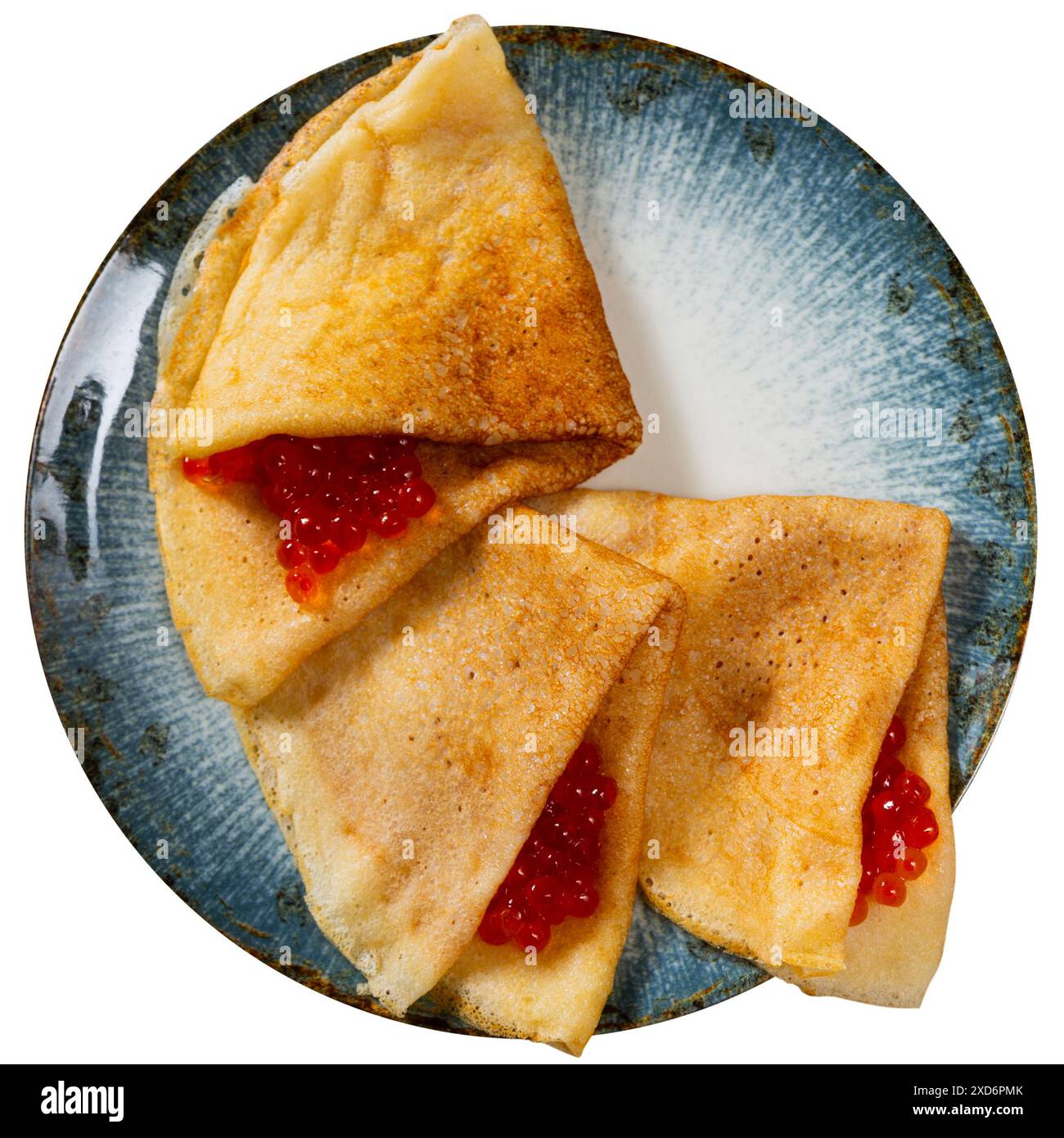 Delicate thin pancakes served with salt cured salmon roe. Famous dish ...