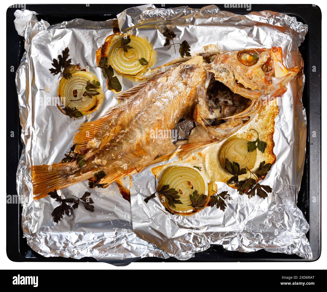 Fried palometa fish on foil - Mediterranean delicacy Stock Photo - Alamy