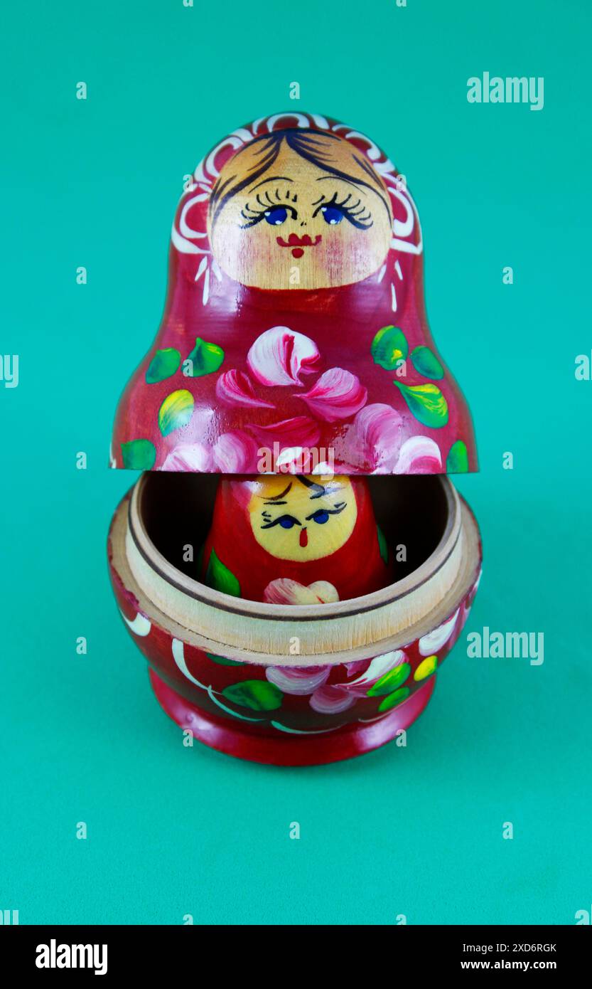 Matryoshka, Russian doll protected by her mother Stock Photo - Alamy