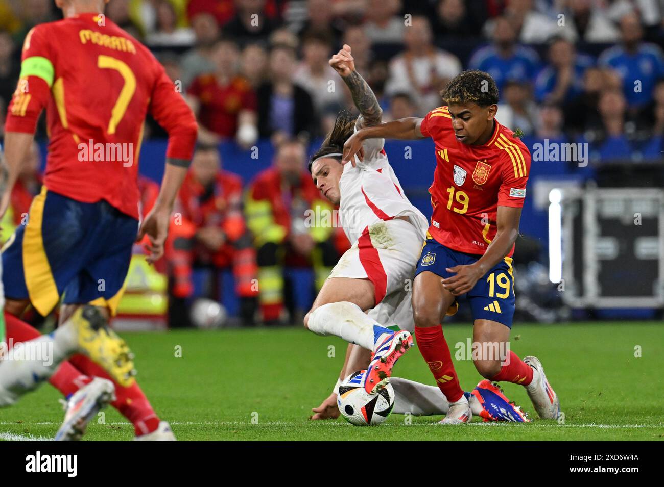 Riccardo Calafiori (5) of Italy fighting for the ball with Lamine Yamal ...