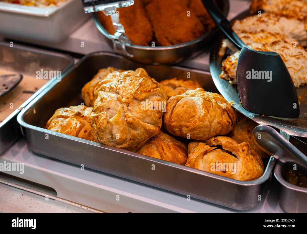 Assortment of empanadas with flavors ranging from savory meats to ...