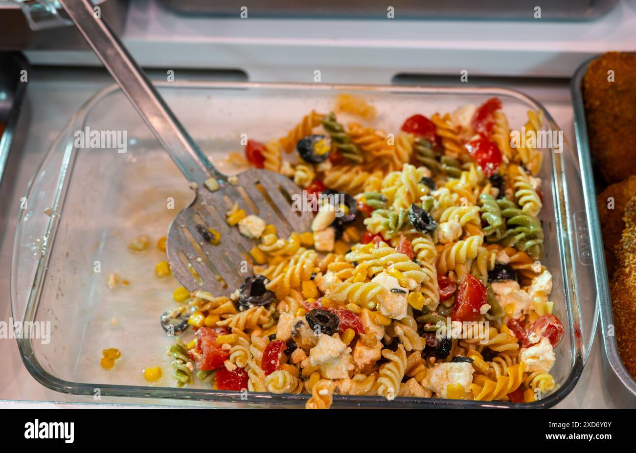 Pasta and pesto salad displayed in deli section of local store Stock ...