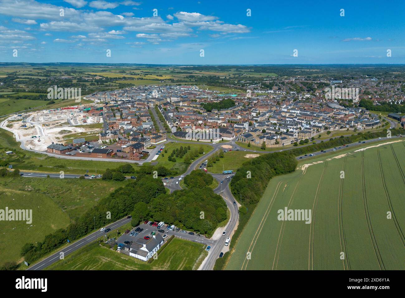 Poundbury, Dorchester, Dorset, UK. 20th June 2024. Aerial view of the ...