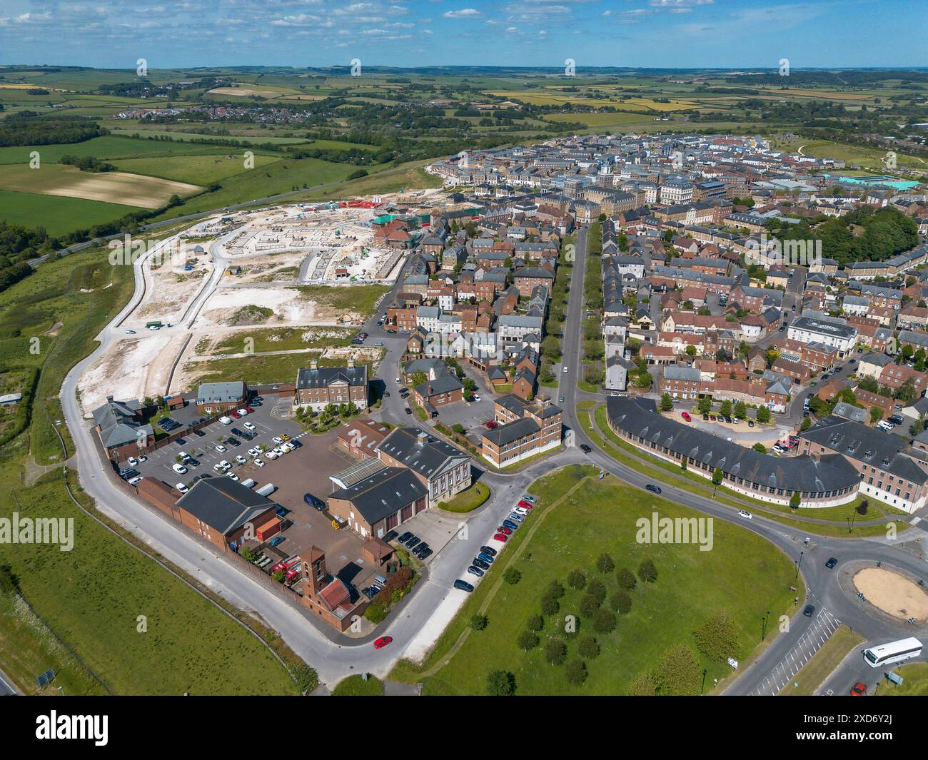 Poundbury, Dorchester, Dorset, UK. 20th June 2024. Aerial view of the ...