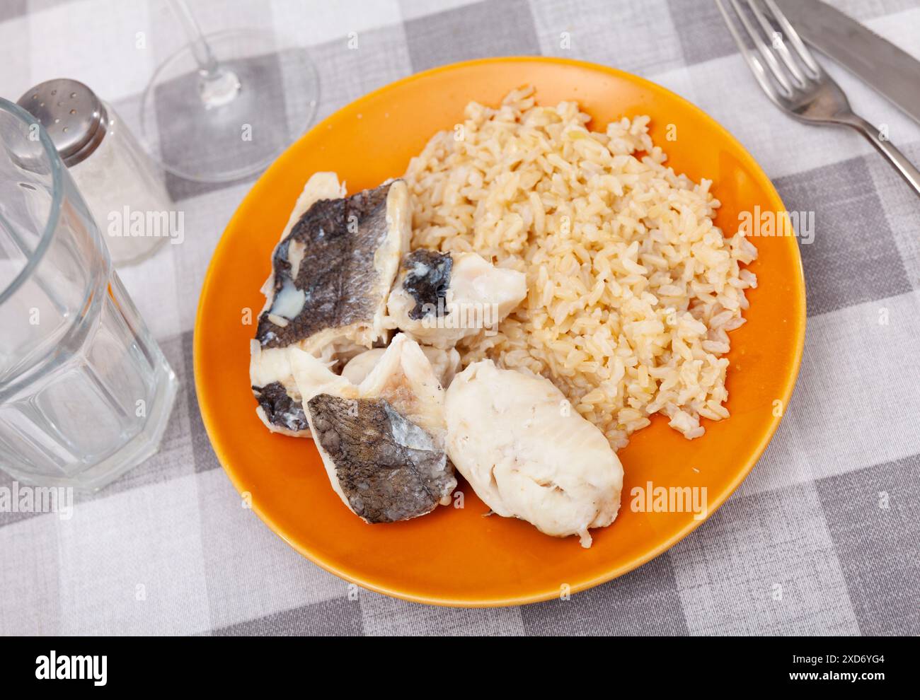 Steamed cod fish with garnish of basmati rice for dinner Stock Photo ...