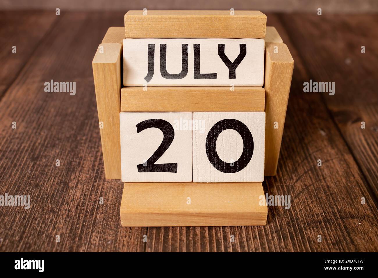 Wooden calendar July 20 on a white background close up Stock Photo - Alamy