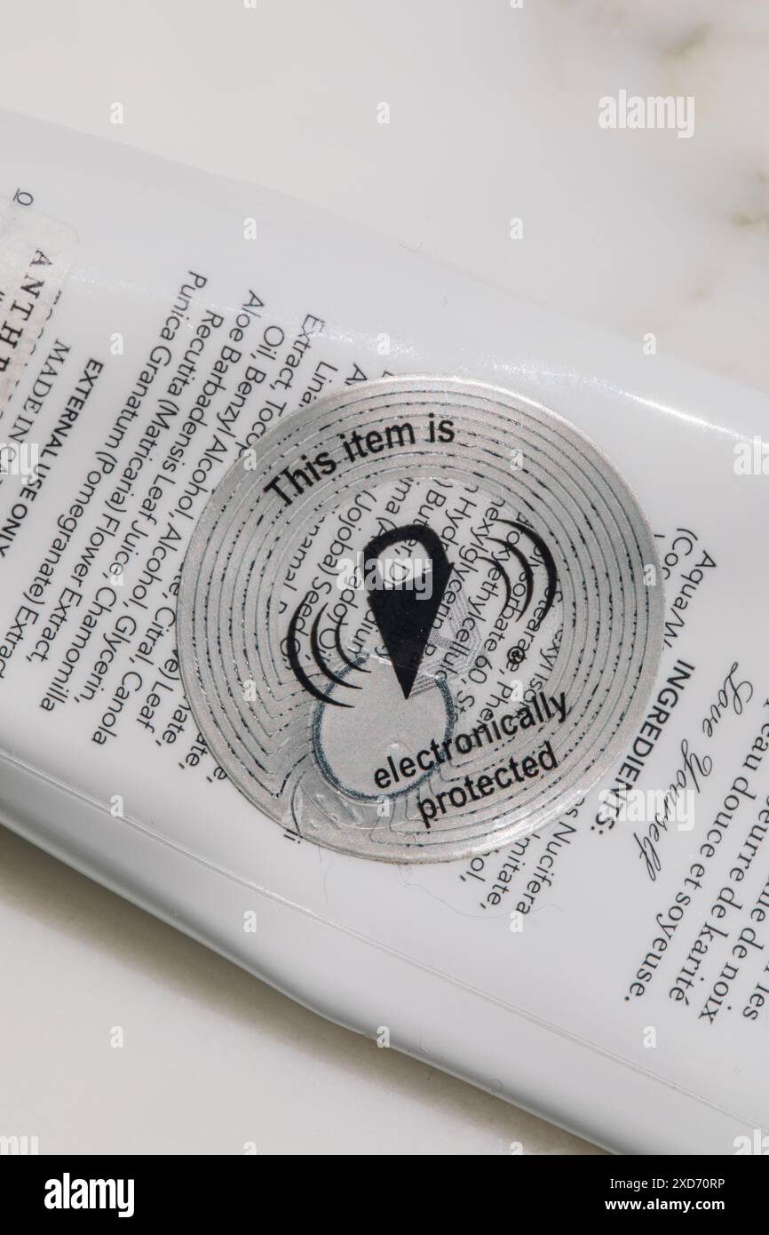 anti-theft electronic protection sticker on mini hand cream tube Stock ...