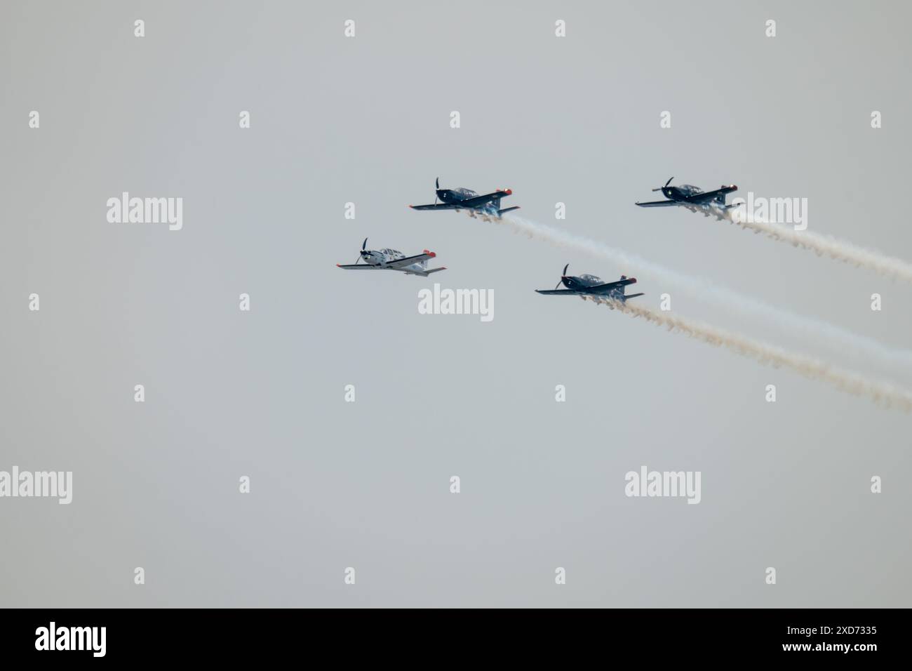Performing Fighter Planes Flying in Formation Stock Photo - Alamy