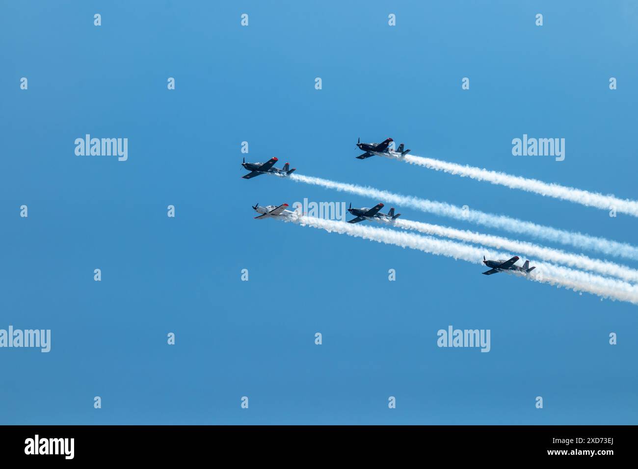 Performing Fighter Planes Flying in Formation Stock Photo - Alamy