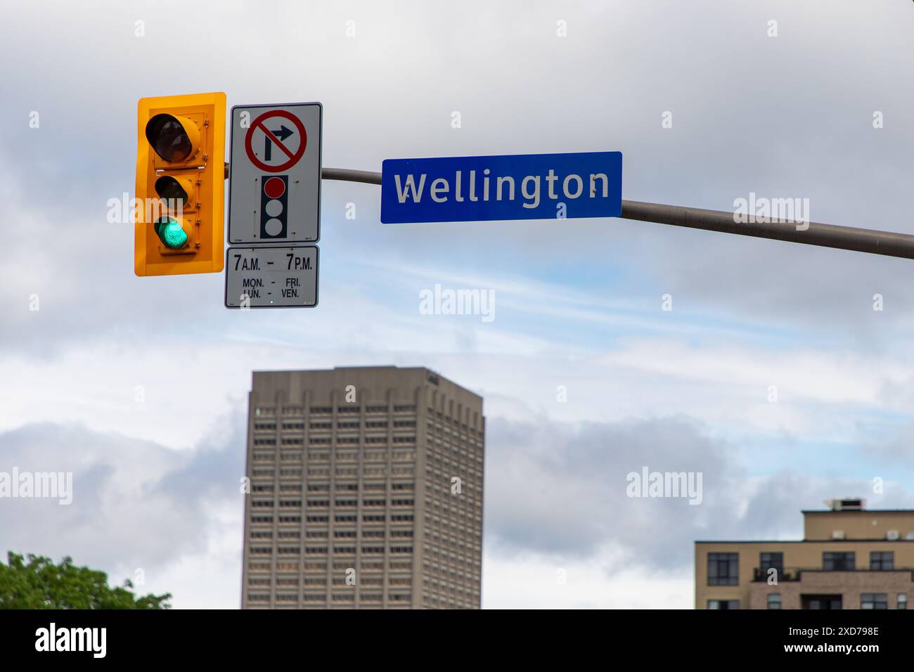 Ottawa, Canada - June 8, 2024: Wellington street sign with traffic ...