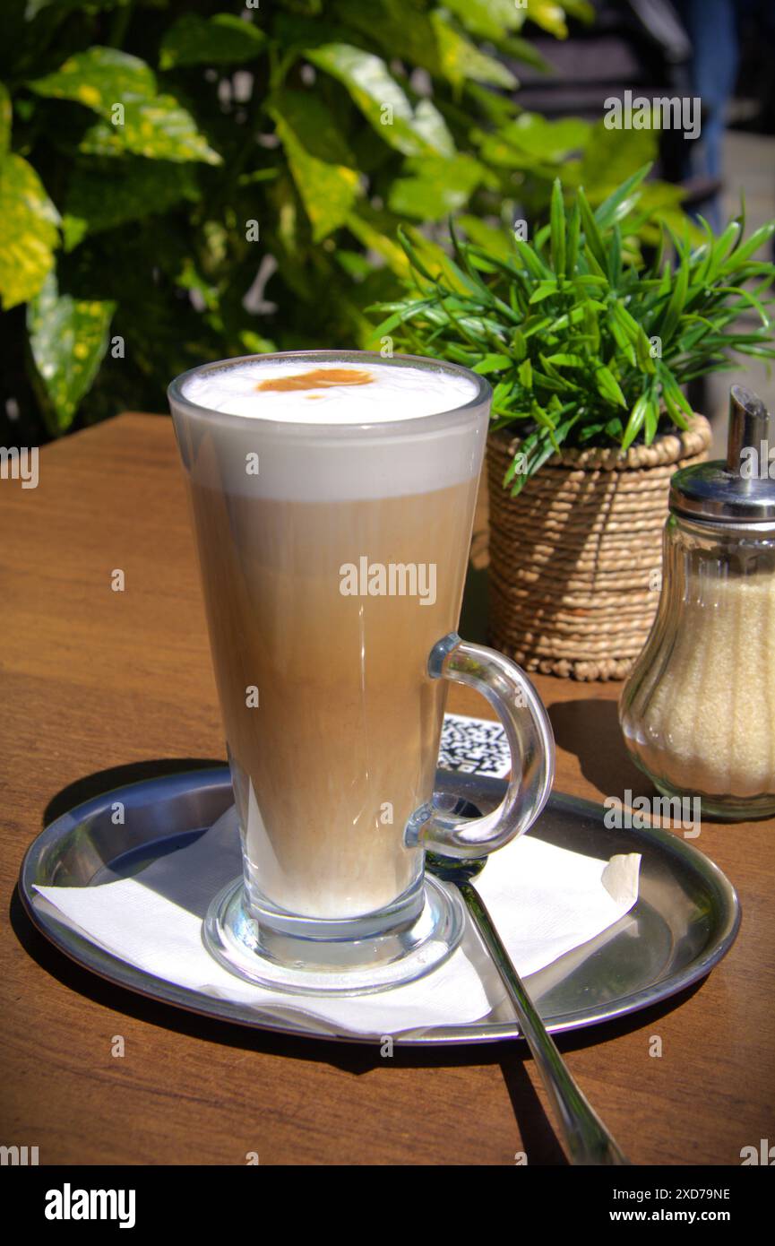 Cafe Latte on a table in a restaurant Stock Photo - Alamy