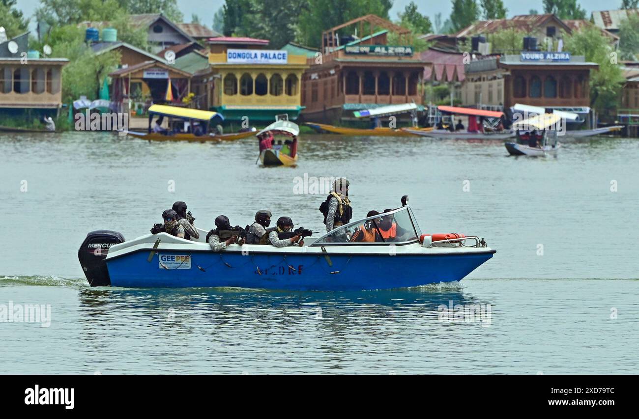 SRINAGAR, INDIA - JUNE 20: Navy's Marine Commandos (MARCOS) patrol in ...