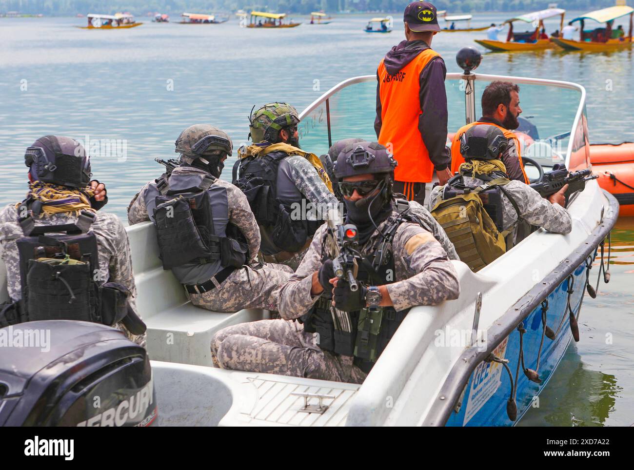 SRINAGAR, INDIA - JUNE 20: Navy's Marine Commandos (MARCOS) patrol in ...