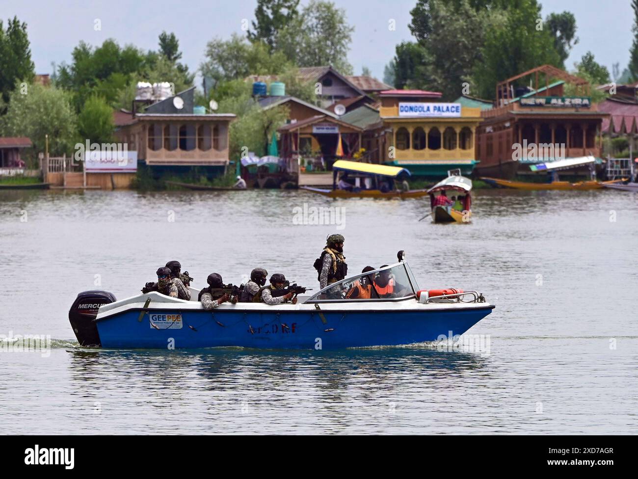 SRINAGAR, INDIA - JUNE 20: Navy's Marine Commandos (MARCOS) patrol in ...