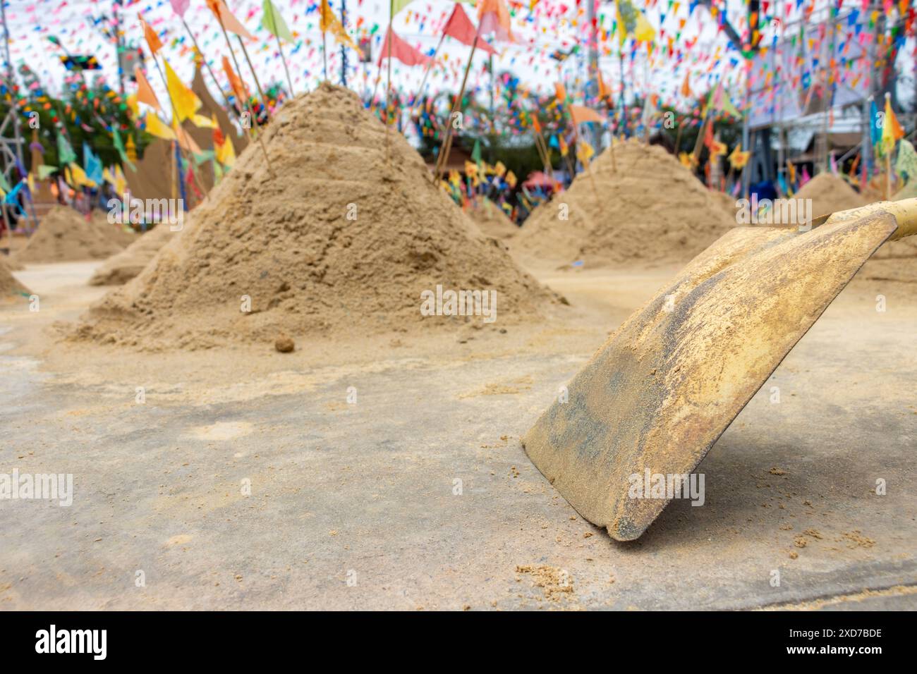 Piles of sand ready to create sand buildings in the Buddhist temple Wat ...