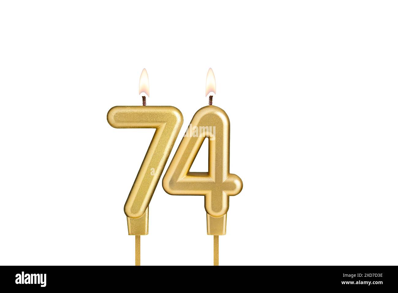 Golden number 74 birthday candle on white background Stock Photo - Alamy