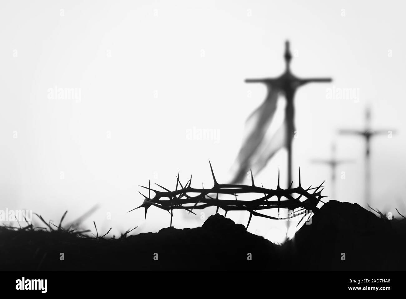 Cross and crown of thorns silhouette symbolizing Jesus' trials and ...