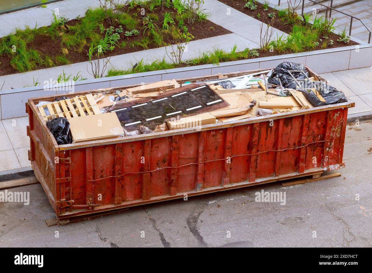 Garbage metal container is used for disposal construction waste during ...