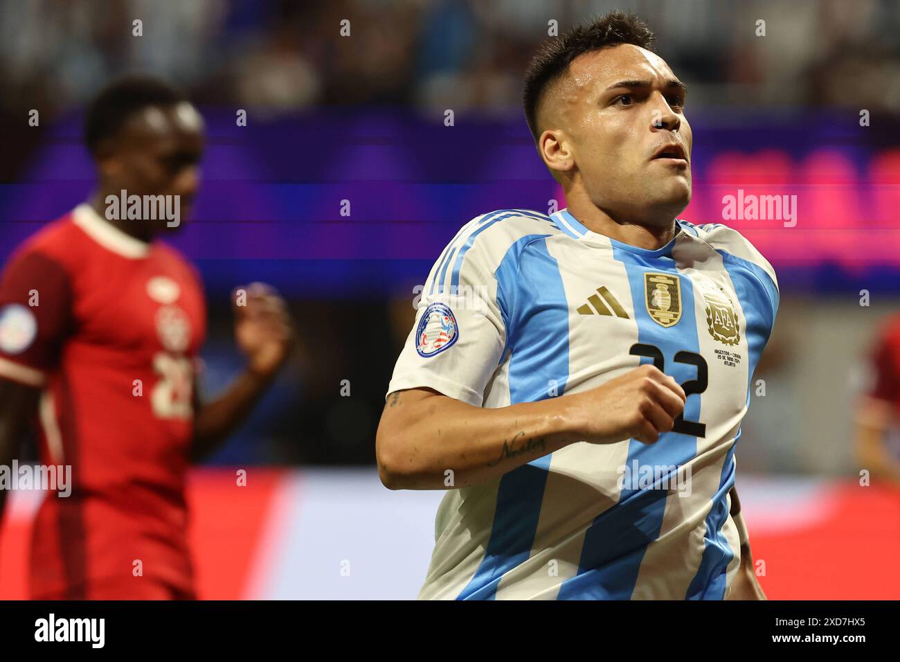 Argentina s forward Lautaro Martinez celebrates after scoring the teams ...